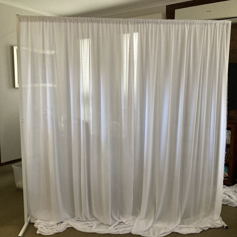 White Metal Display Stand with White Backdrop. | Wedding Decor for Hire